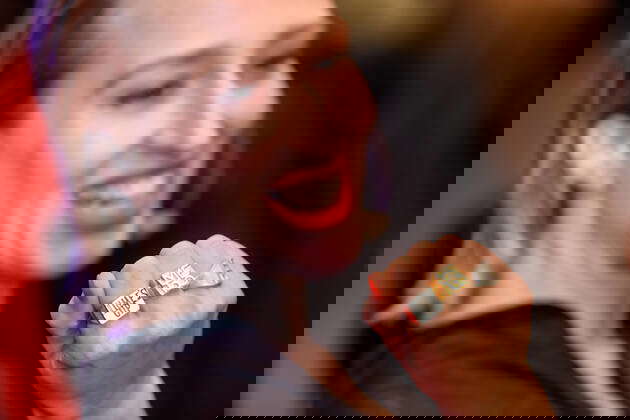 Actress Juliane Elting with me too and Time s Up Ring shows middle ...