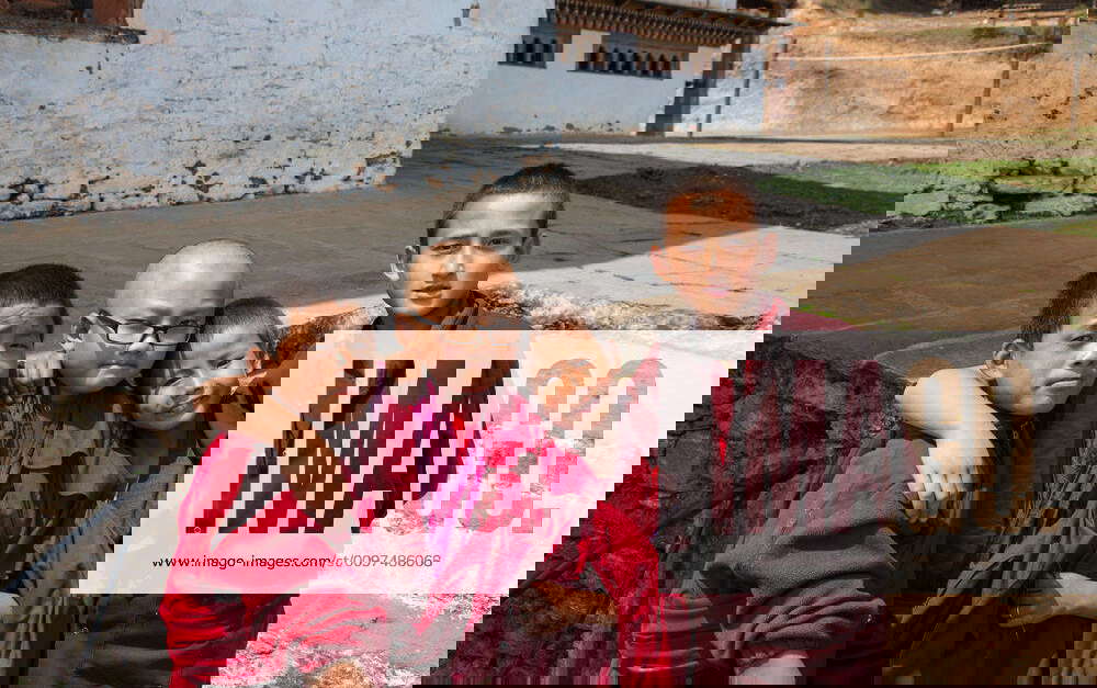 Four young novice monks in the Talo Buddhist Monastery pose for their ...