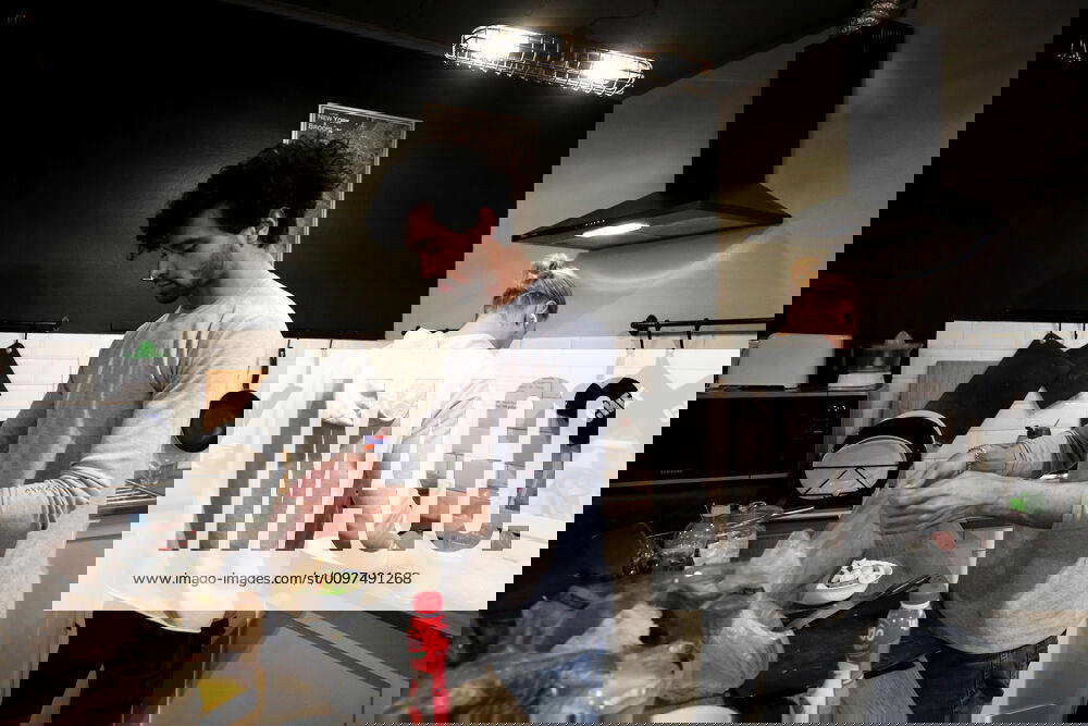 MOSCOW, RUSSIA - MARCH 3, 2020: People in a kitchenette at the LogINN ...