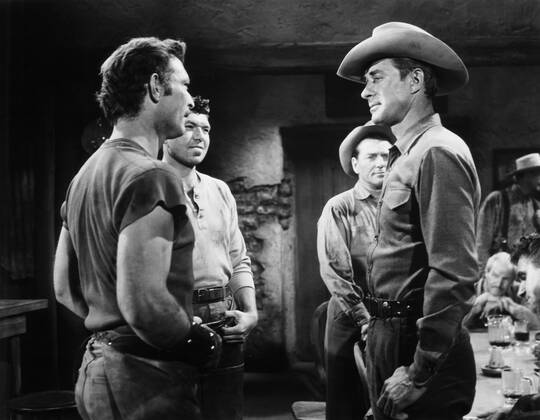 STAGECOACH OUTLAWS, second and third from left: Buster Crabbe, Kermit ...