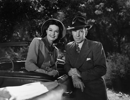 MICHAEL SHAYNE: PRIVATE DETECTIVE, from left, Marjorie Weaver, Lloyd Nolan, 1940. TM & Copyright