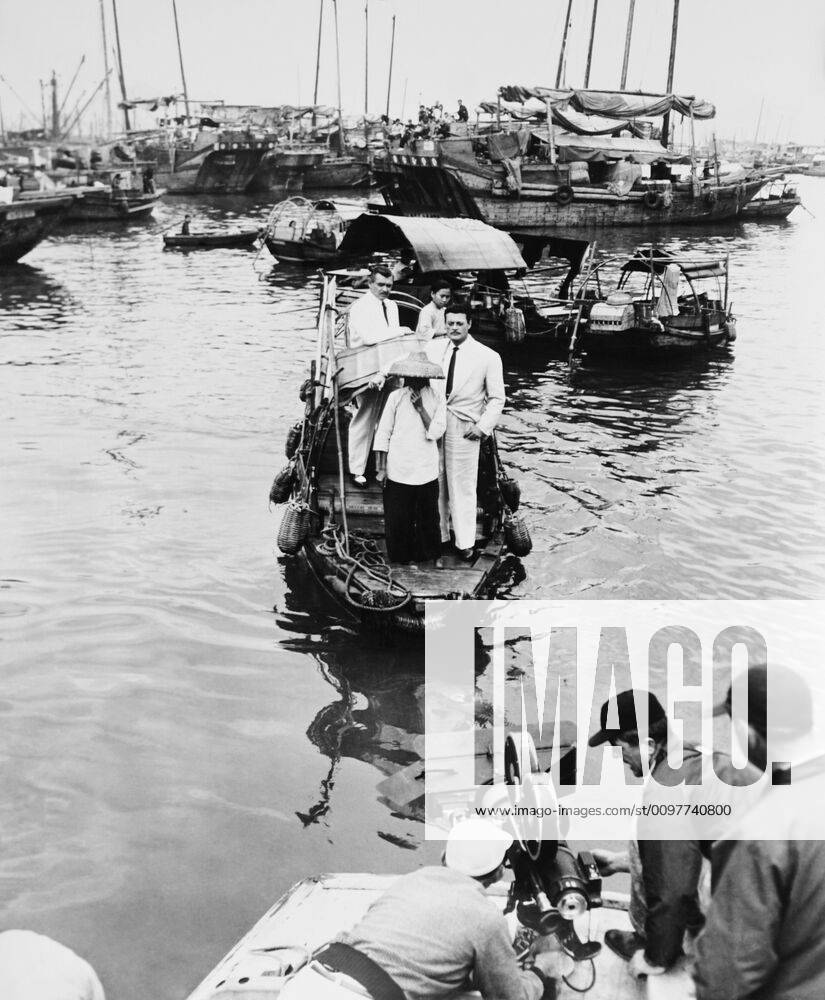 SOLDIER OF FORTUNE, Clark Gable (on boat rear), Alex D Arcy (on boat ...