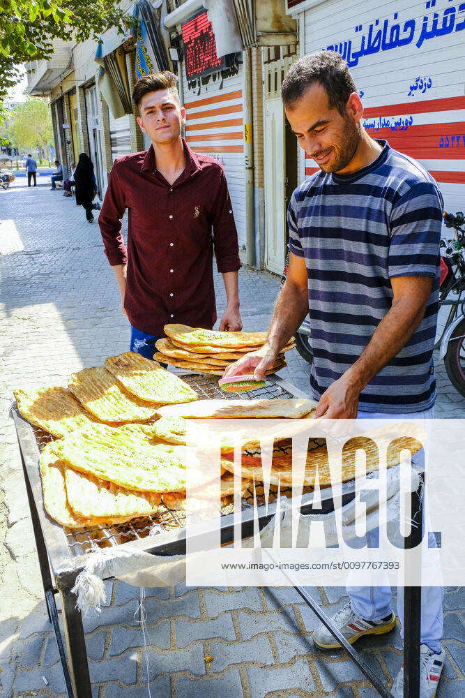 Men making iranian bread (barbari bread) on a street. Kashan. Iran ...