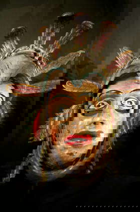 A carving of a face, mask inside the National Museum of the American ...