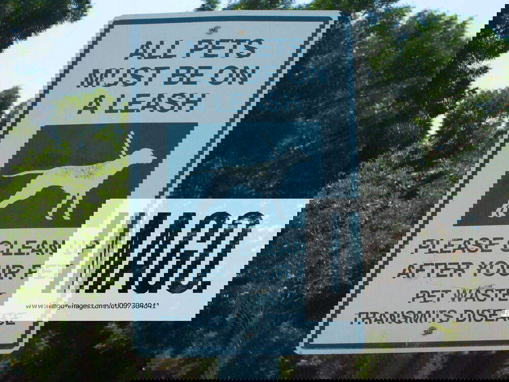 All Pets Must Be On A Leash Sign All pets must be on a leash sign in a ...