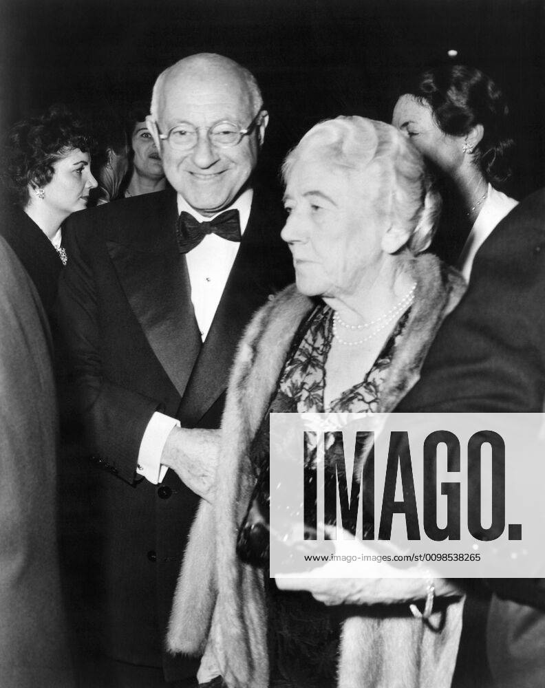 Front from left: producer director Cecil B DeMille and wife Constance ...