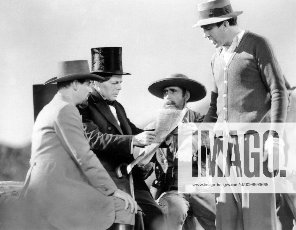 JUAREZ, from left, Joseph Calleia, Paul Muni, Joseph Calhern, director ...
