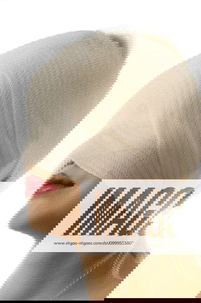 Mummy profile profile of woman with bandage around face and red lips