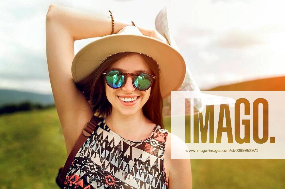 Stylish Hipster Woman Traveler Holding Map With Fashionable Sunglasses