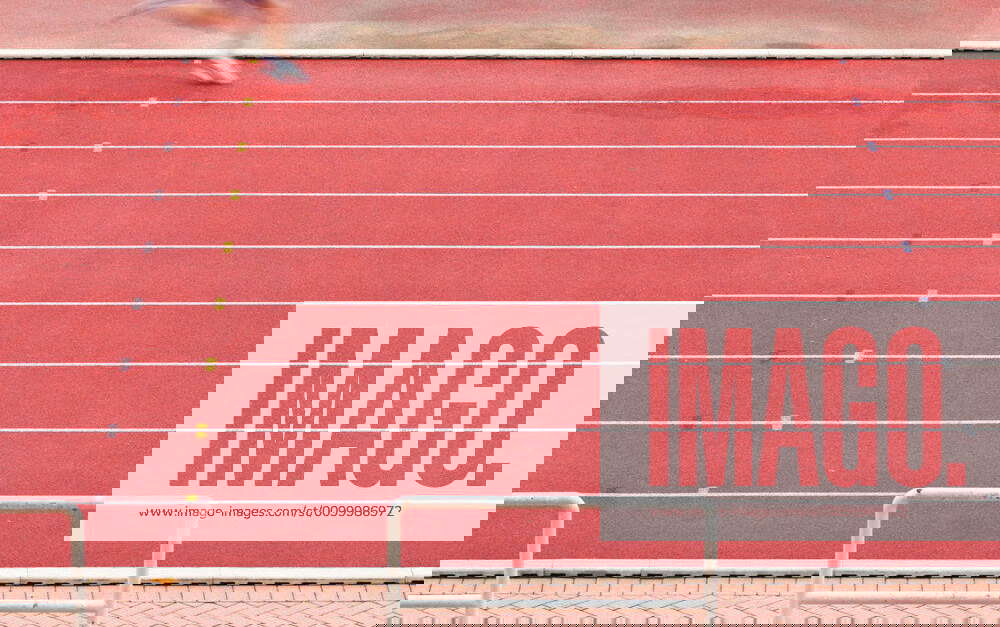 Athlete on running way Athlete on running way