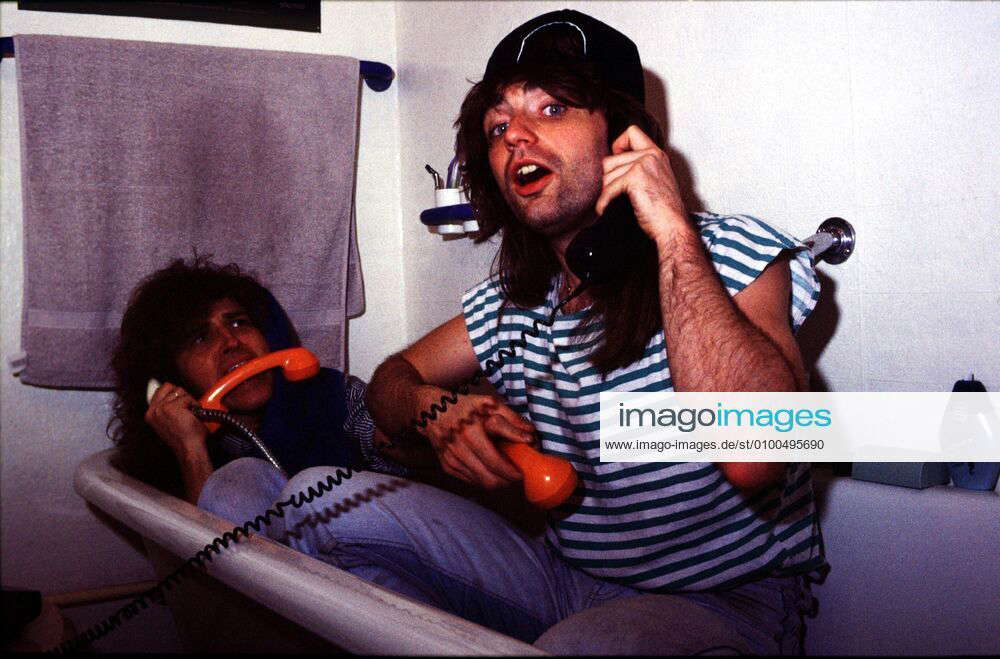 3 Portrait Trans AM, band in the bathtub while talking on the phone ...