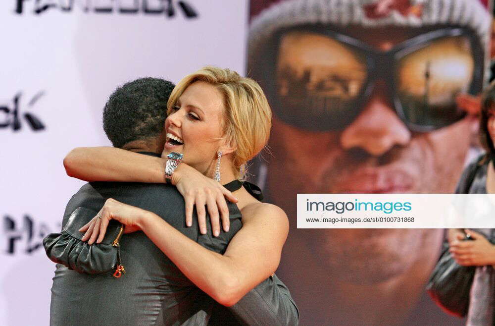 77 Film Will Smith and Charlize Theron hugging each other, Hancock at ...