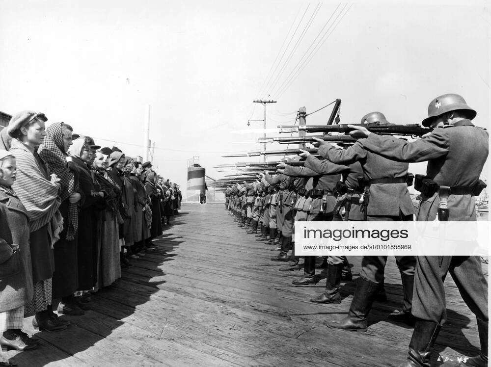 EDGE OF DARKNESS NAZI FIRING SQUAD A WARNER BROS FILM Date: 1943 ...