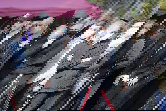 MOSCOW, RUSSIA - : People attend a funeral of Russian neo-Nazi activist ...