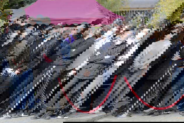 MOSCOW, RUSSIA - : People attend a funeral of Russian neo-Nazi activist ...