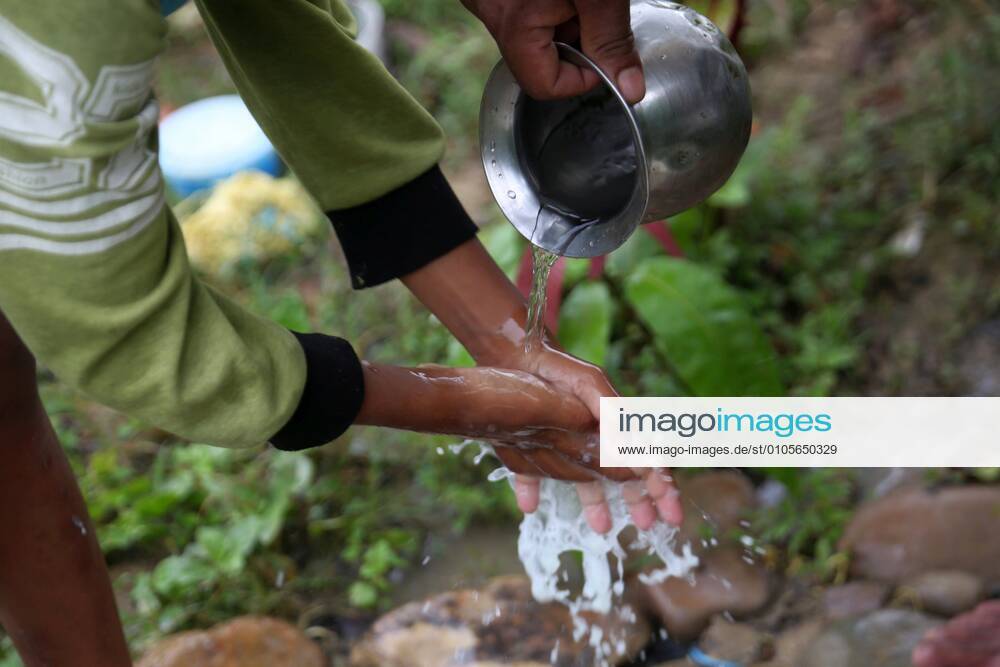 Dang, Nepal: A kid washs his hands on Global Handwashing Day at ...