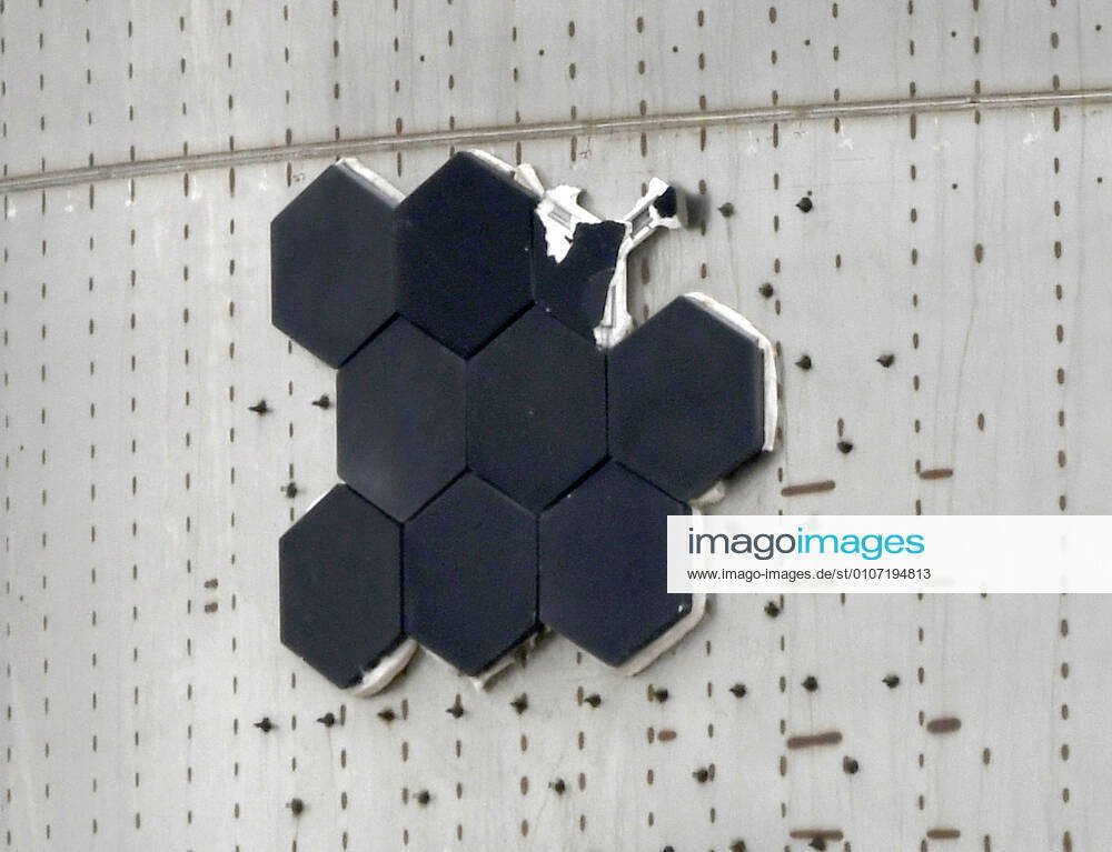 New heat tiles are seen on StarShip SN8 as crews prep the rocket for a ...