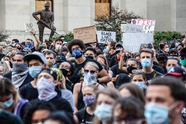 June 25, 2021, Columbus, Ohio, United States: A protester speaks to ...