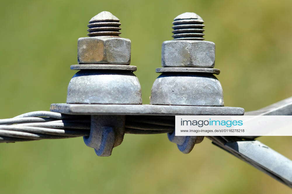 Two screws hold a wire rope A wire rope is held with Two big screws ...