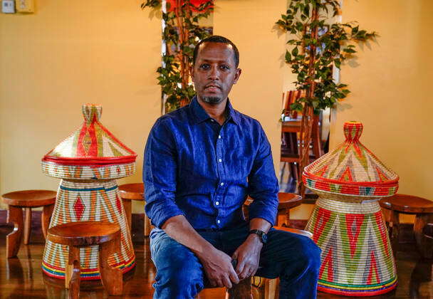 Solomon Hailie, owner of Bole Ethiopian Restaurant, poses in front of ...