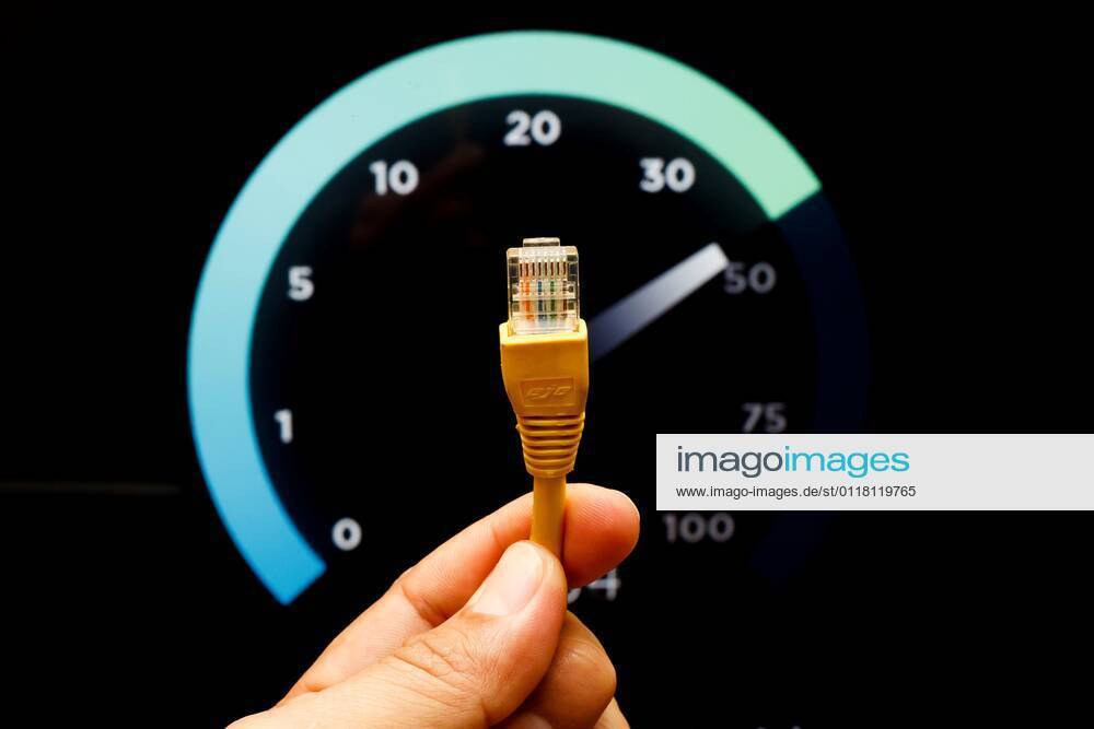 One person holds an internet network cable, in Mexico City, Mexico, 15 ...