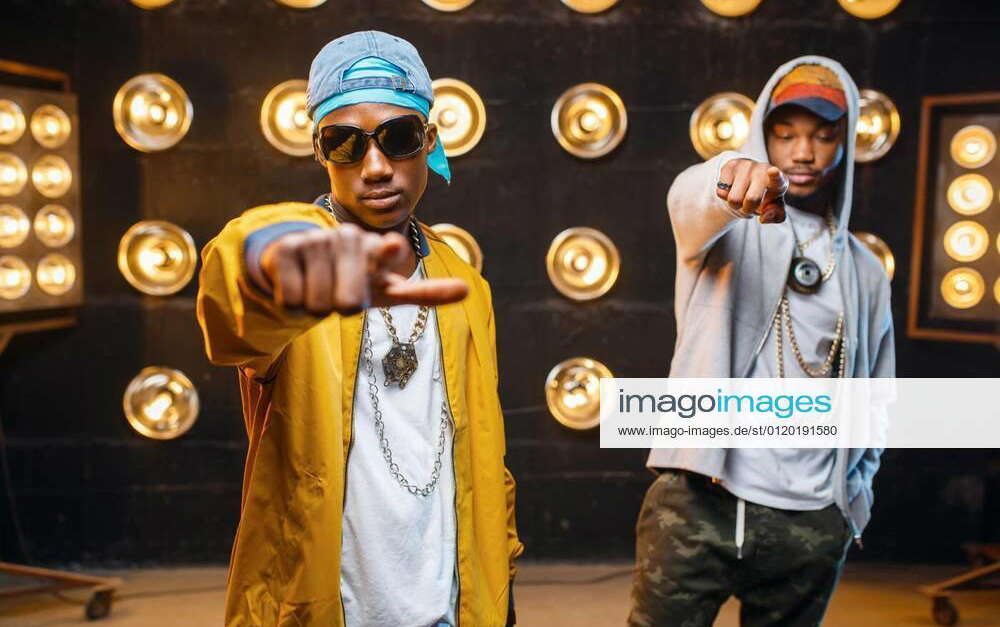 Two Black Rappers In Caps Artists Poses On Stage Model Released