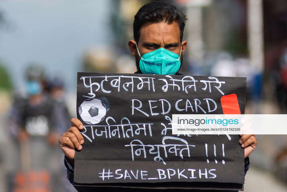 Protest Against Corruption In The Medical Field A Youth holds a placard ...
