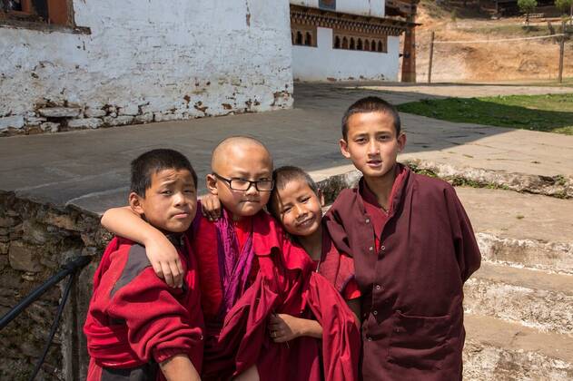 Four young novice monks in the Talo Buddhist Monastery pose for their ...