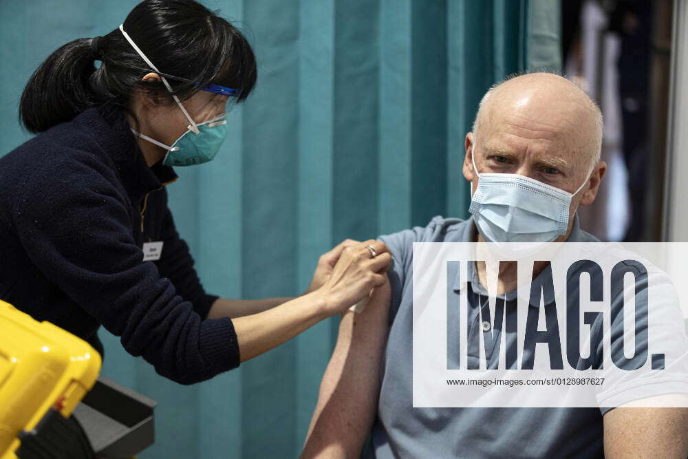 VICTORIA CORONAVIRUS COVID19, A man receives the AstraZeneca COVID-19 ...