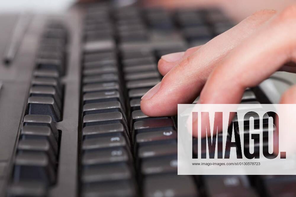 Man Using Computer Keyboard