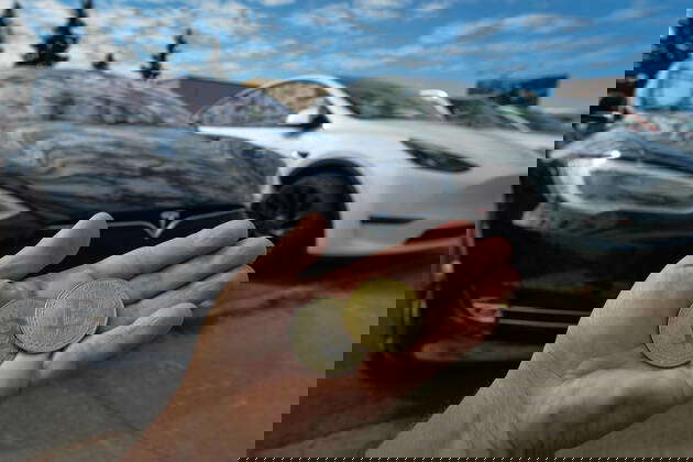 Daily Life In Edmonton Illustrative image of two commemorative bitcoins ...