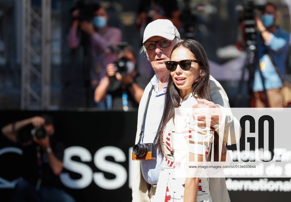 Spanish filmmaker Carlos Saura poses with his daugter Anna Saura as he ...