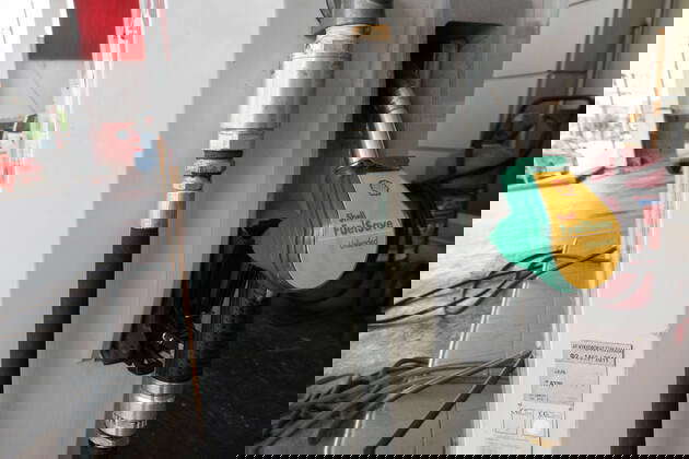 Shell Gas Station Filling nozzles and pumps at a Shell gas station in ...