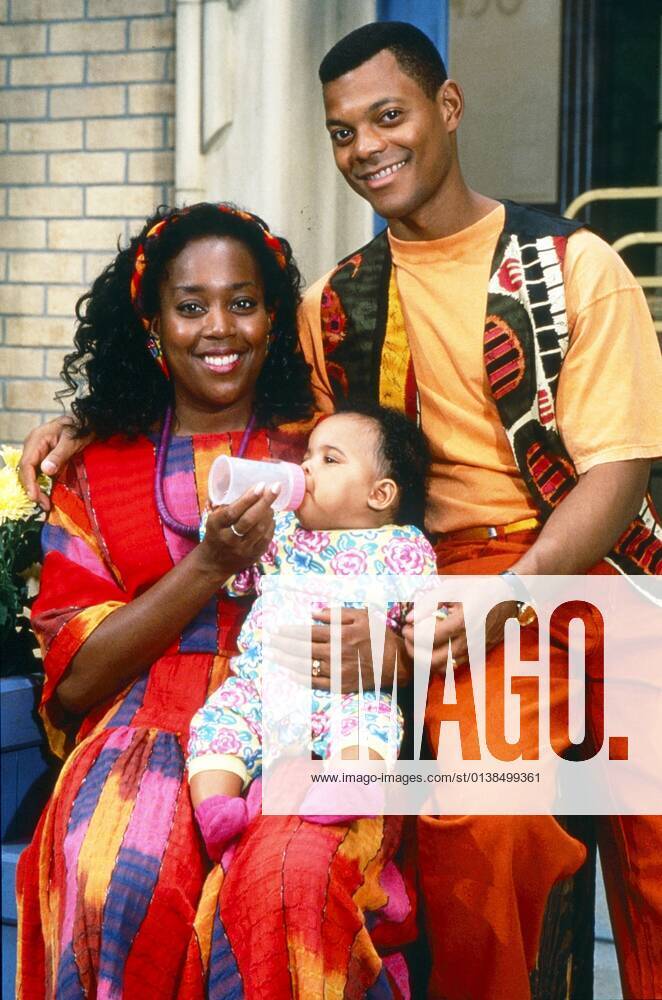 SESAME STREET, from left: Angel Jemmott, Jou Jou Papailler, holding ...