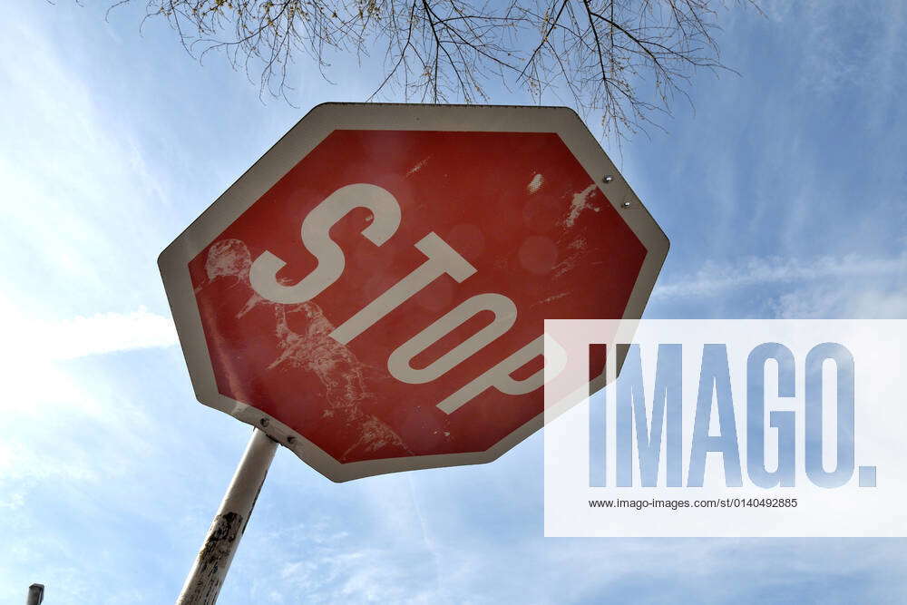 bent stop sign, vandalism bent stop sign, vandalism