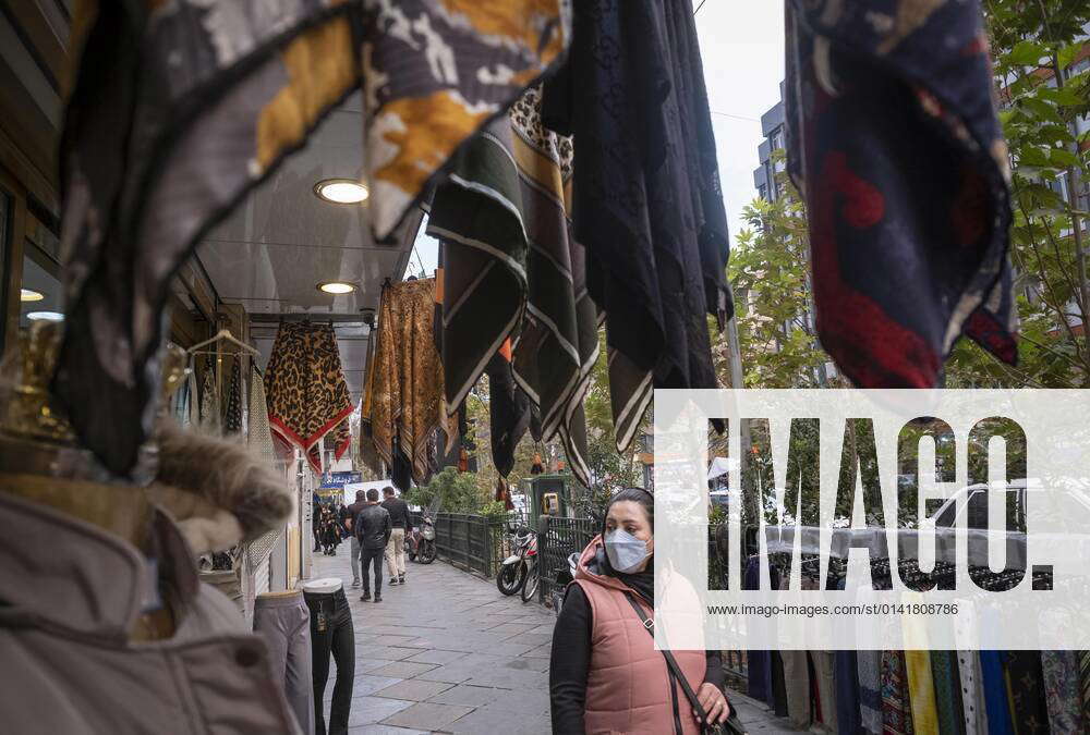 Daily Life In Downtown Tehran An Iranian Woman Wearing A Protective