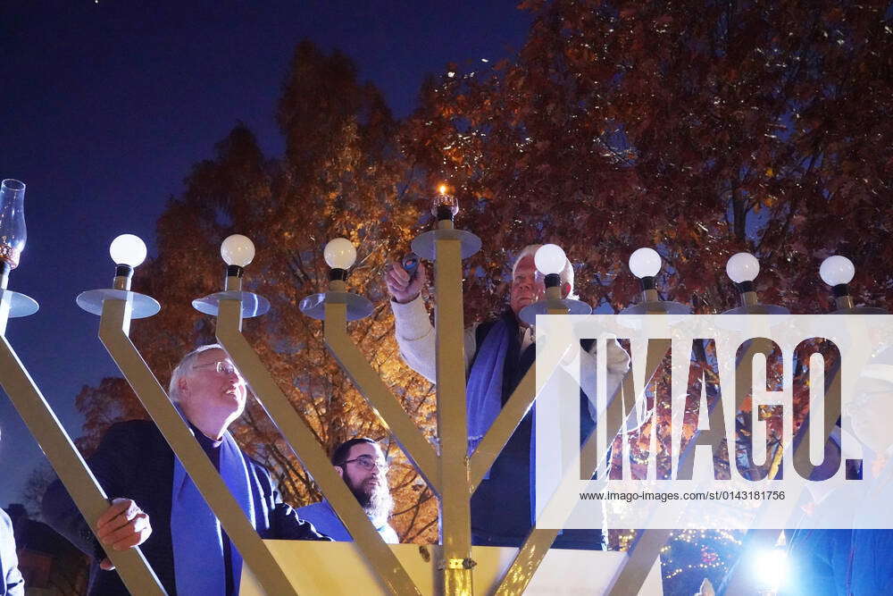 St. Charles, Missouri mayor Mayor Dan Borgmeyer lights the shammash ...