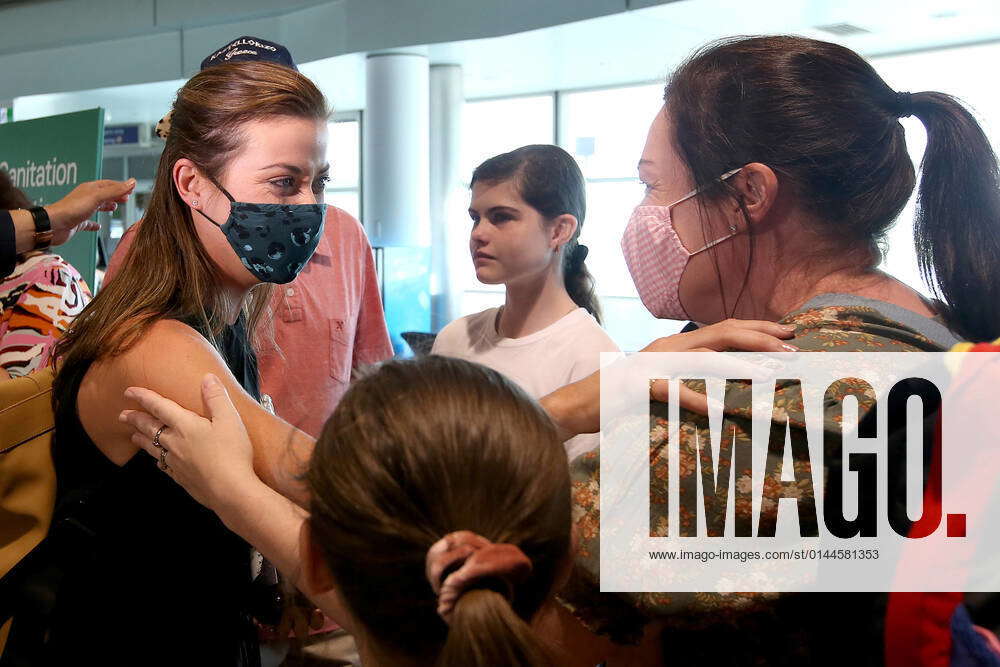 QLD BORDER REOPENING, Rebecca Underhill (left) is reunited with family ...