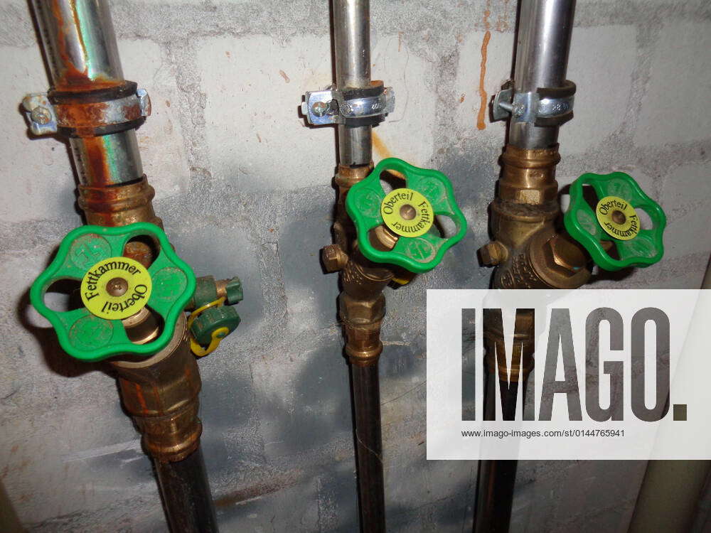 View of three risers for cold water with corresponding safety shut-off ...