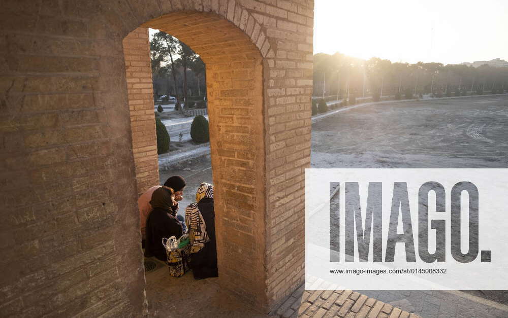 Dried-up Zayandeh Rud River In Isfahan Iranian women sit on the Khaju ...