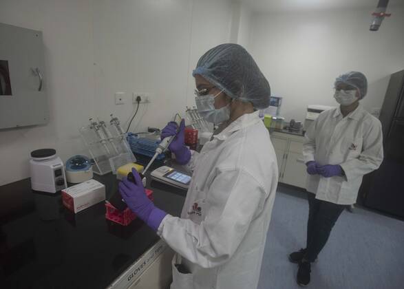 PUNE, INDIA - FEBRUARY 16: Project assistants Unnatti Bhalerao and ...