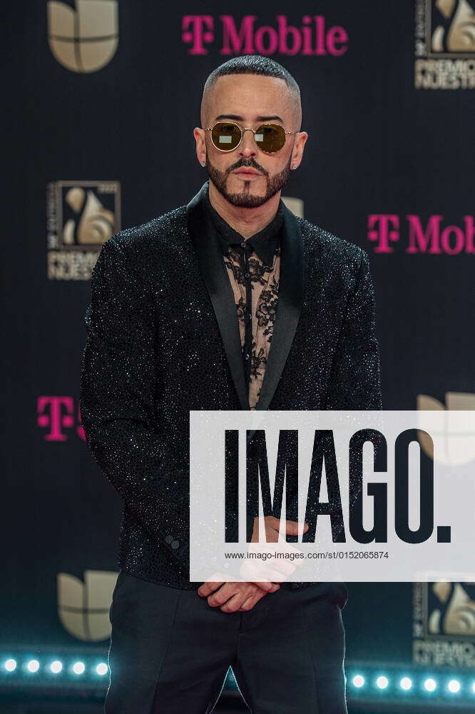 The Puerto Rican singer Yandel poses on the magenta carpet of the Lo ...