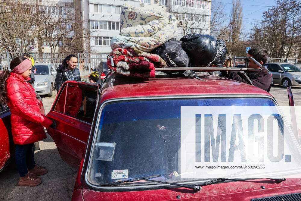 DZHANKOI, CRIMEA, RUSSIA – MARCH 22, 2022: A car is seen outside a ...