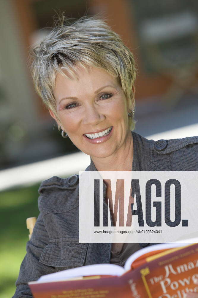 Woman Reading Novel, model released, , property released, , 9875240 ...