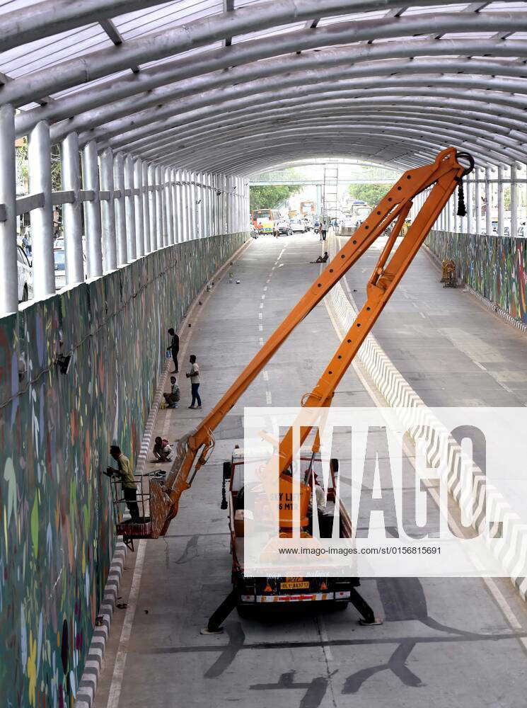 NEW DELHI, INDIA APRIL 23: Workers give final touches to the Ashram ...