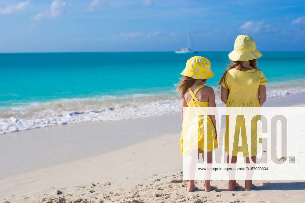 Back view of two little girls on caribbean vacation , 14193938, baby ...