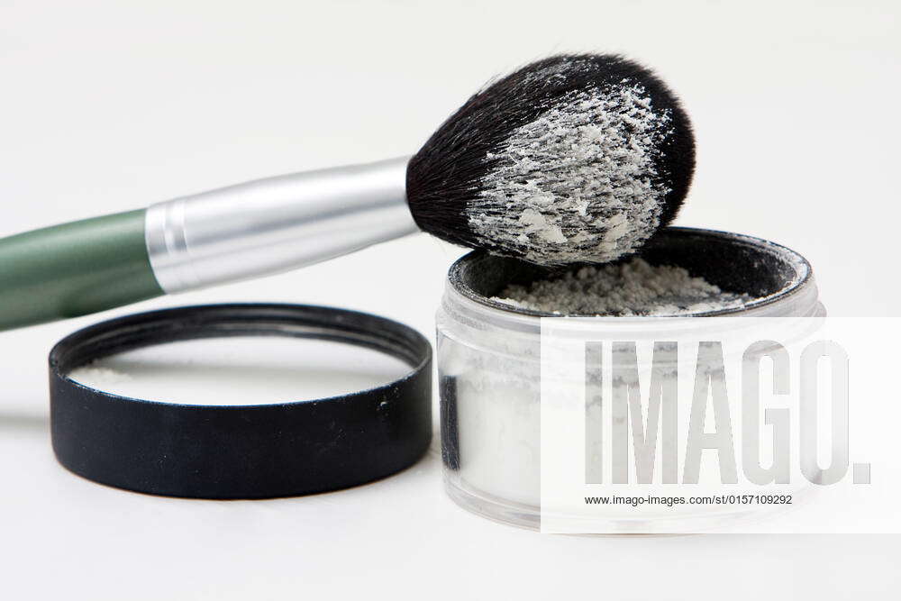 Translucent white powder in a jar and on brush, isolated, 616909, white ...