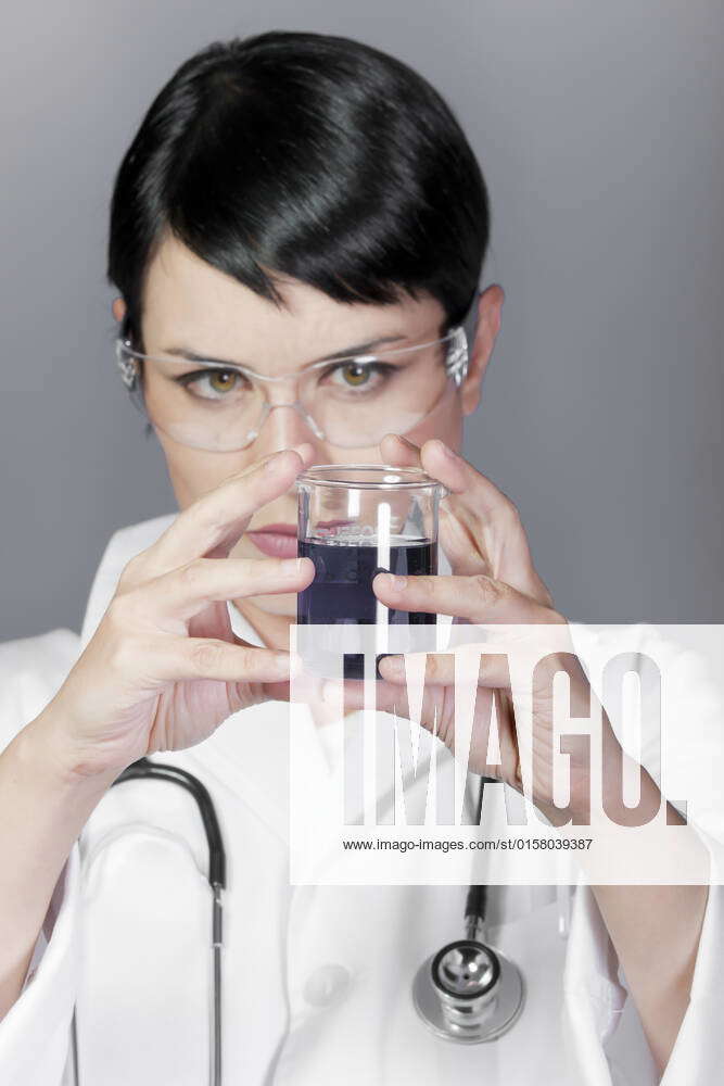 Laboratory brunette female doctor on research and development, PHD ...