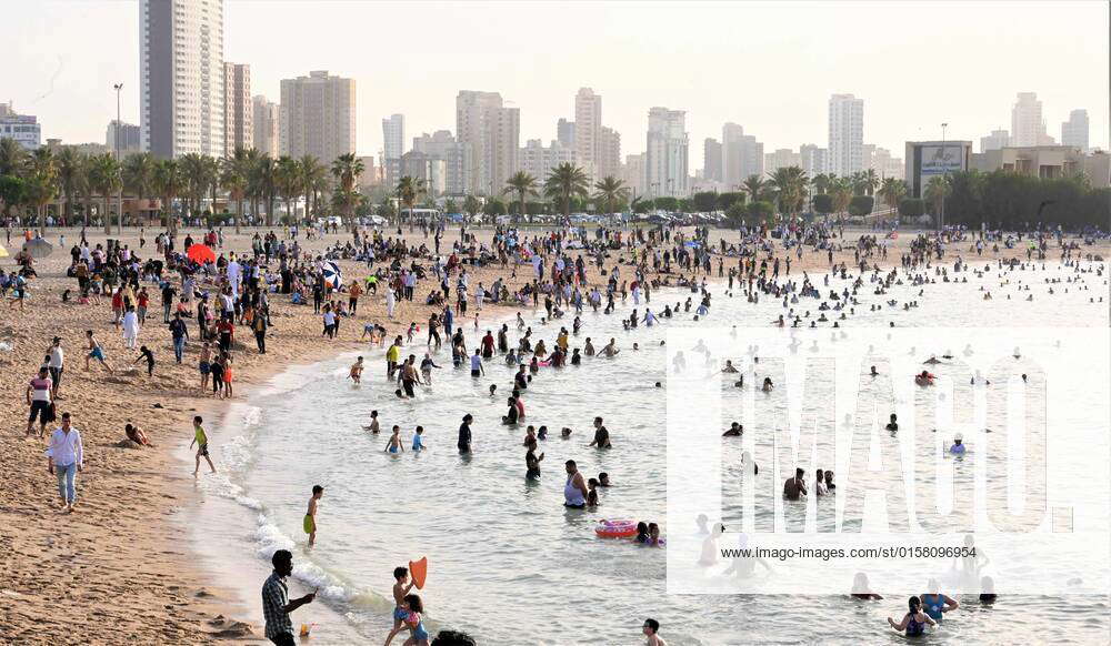 HAWALLI, People relax on a beach during the Eid al-Fitr holiday in ...