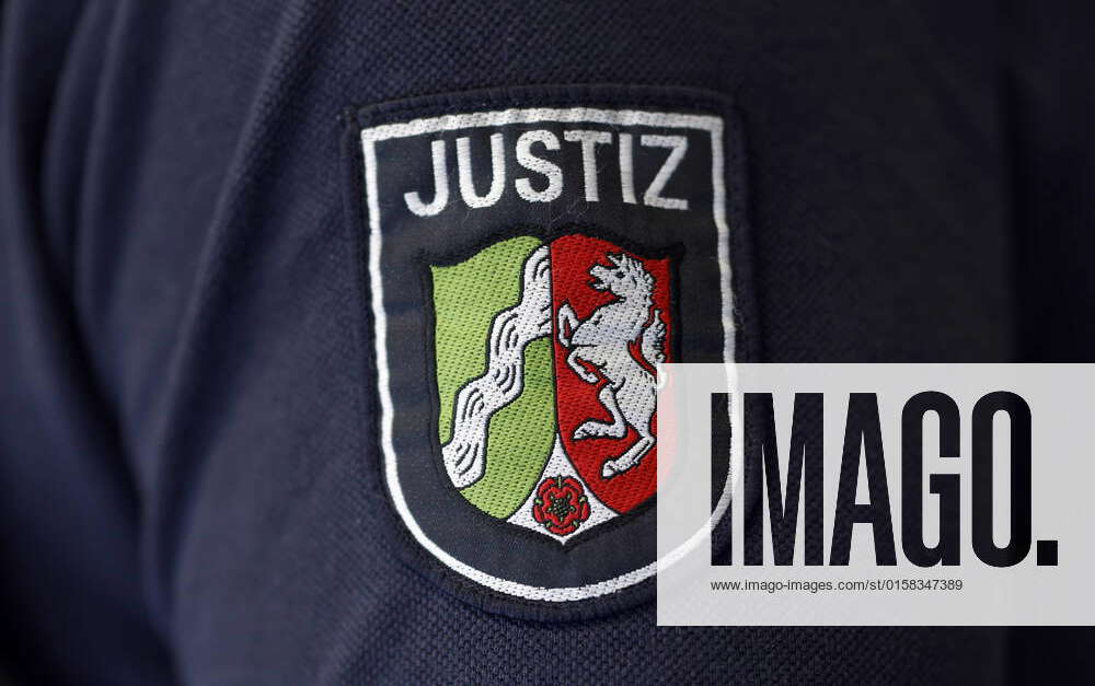 A JUSTICE patch with the coat of arms of the state of NRW on the ...